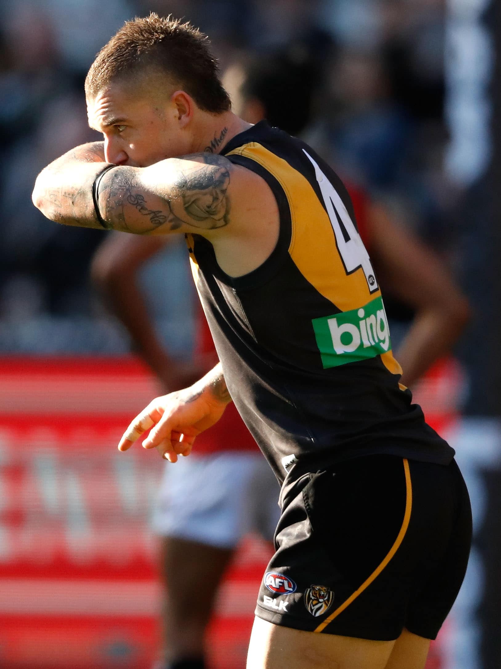 Dusty stars as Tigers hold off Dons