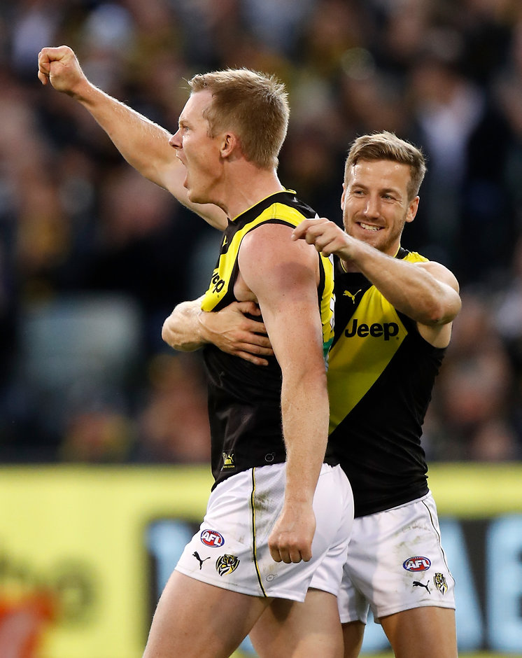 Tigers power past Pies' challenge