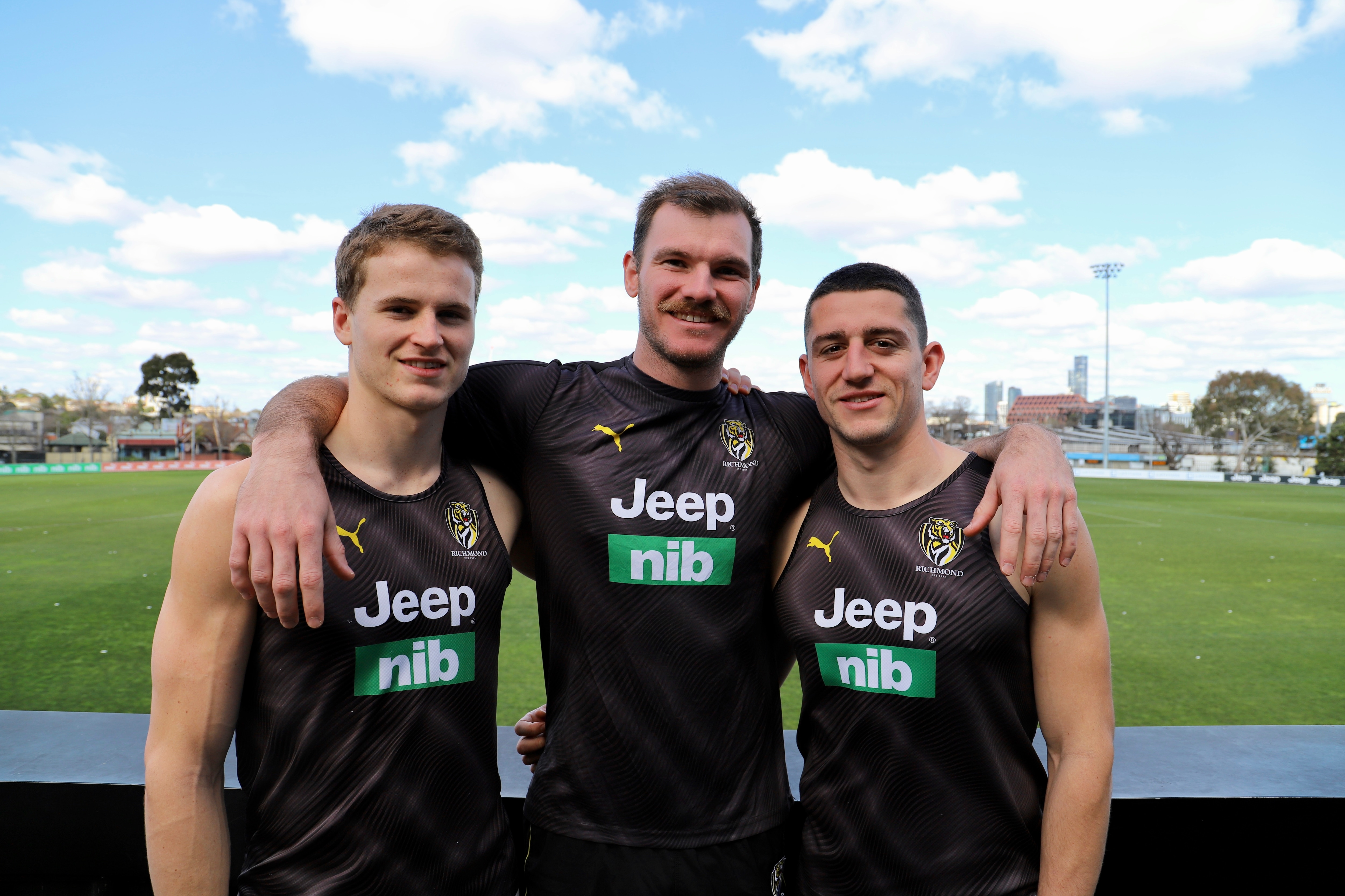 Trio of Tigers re-sign