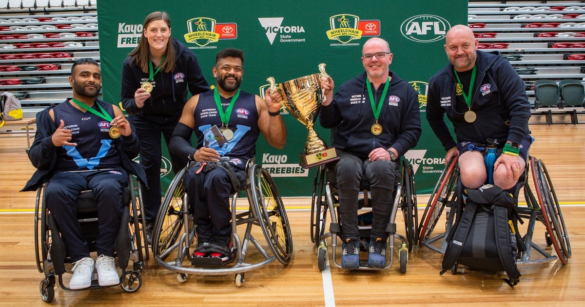 Henderson and Morris hold another cup aloft as Vics claim first ...